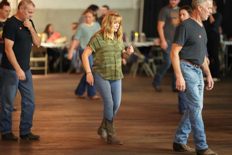 Country line dancing event in Columbia helps raise money for animal ...