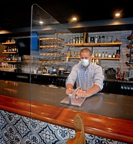 Mick's All American Pub owner teams with Tait to create see-through ...