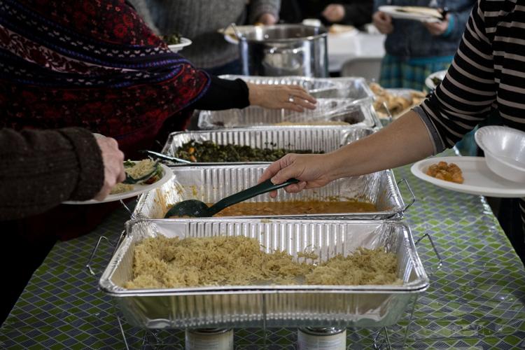 Refugees, Amish gather for lunch, share experiences of coming to ...