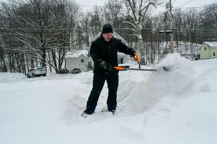 Shoveling snow? Over-exertion and cold temps can raise your heart risks ...