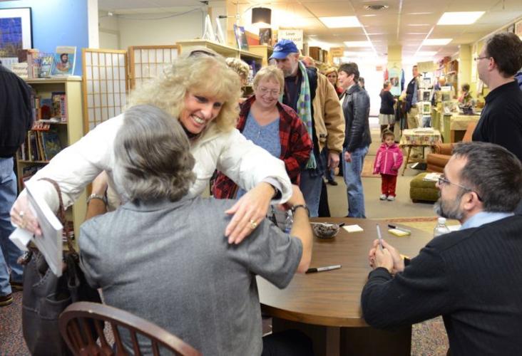 Tim Kreider greets friends, signs book about coping with son's crime ...