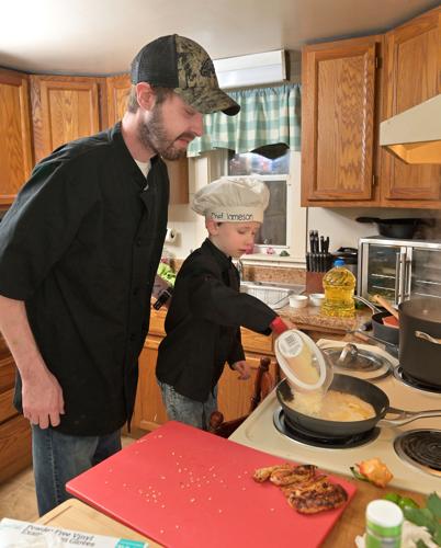 Brett and Jameson Geesey enjoy cooking together in their kitchen ...