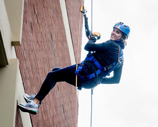 Rappelling down the side of a Lancaster building: VisionCorps EyeDrop ...