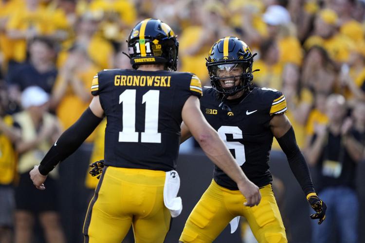 Iowa's Kirk Ferentz becomes Big Ten's winningest coach as Hawkeyes beat Massachusetts, 47-7 ...