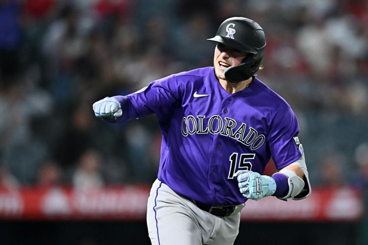 Goodman's 3-run homer and Rumfield's sac fly help Rockies rally for 9-8 ...