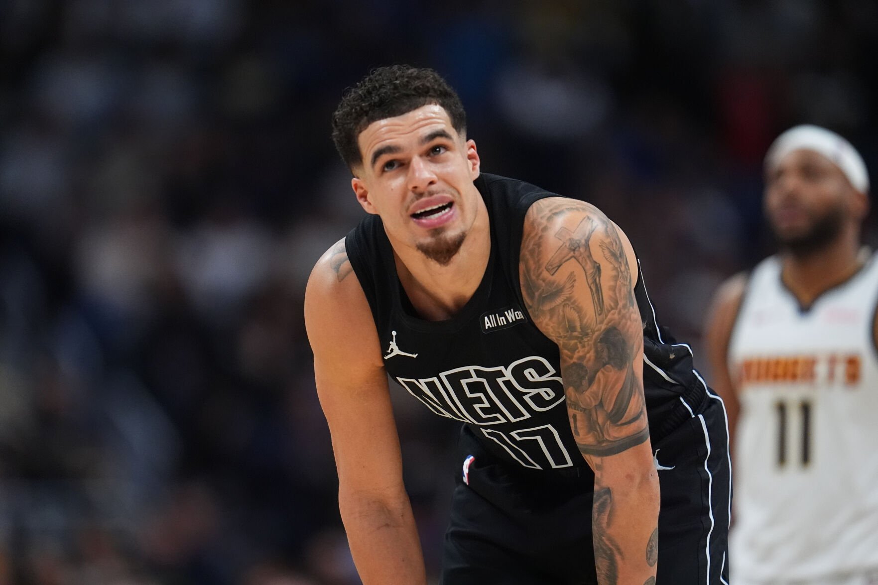 Murray logra 27 puntos y Nuggets vencen 107-103 a Nets en el regreso de ...