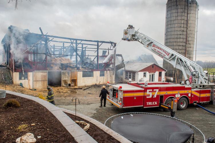 Firefighters save 3 trapped cows while battling barn fire in Colerain ...