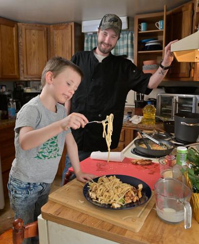 Brett and Jameson Geesey enjoy cooking together in their kitchen ...