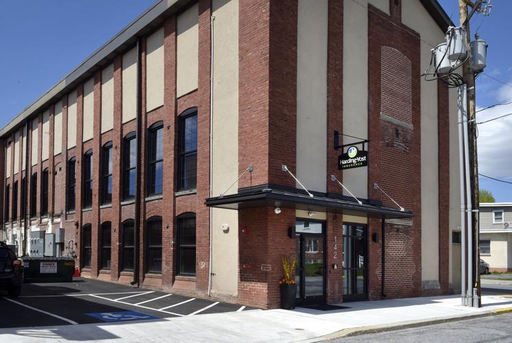 Denver insurance company expands into vacant, historic silk mill ...