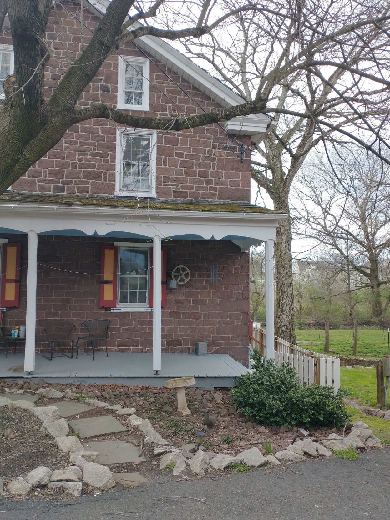 This 1840 stone house has a walk-in fireplace, a mill next door and ...