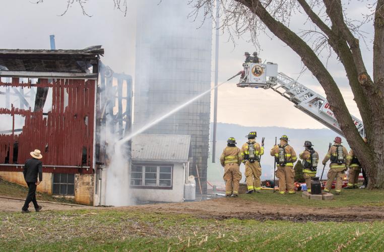 Firefighters save 3 trapped cows while battling barn fire in Colerain ...