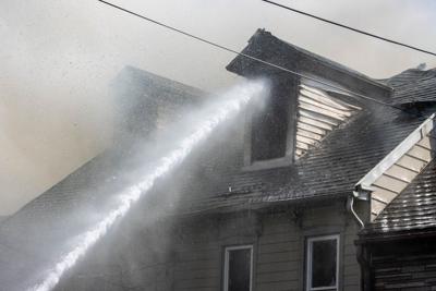 Multiple homes and a business destroyed in Columbia fire, 8 people ...