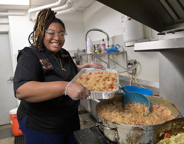 Staff, volunteers cook for Soul Food Thursdays at Crispus Attucks ...