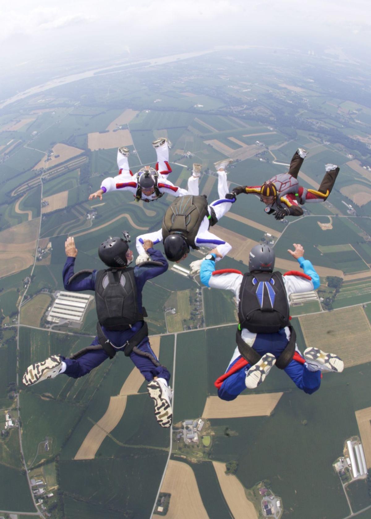 Group sets state skydiving record for Jumpers Over Seventy | Local News ...