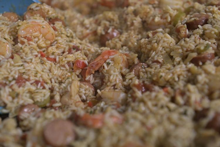 Staff, volunteers cook for Soul Food Thursdays at Crispus Attucks ...