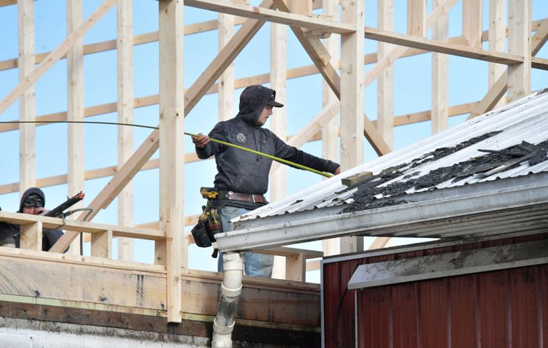 Starting again: Residents help to rebuild barn destroyed by fire in ...