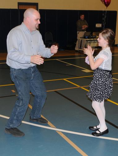 Dads, daughters bond at Hans Herr Elementary sweetheart dance | News ...