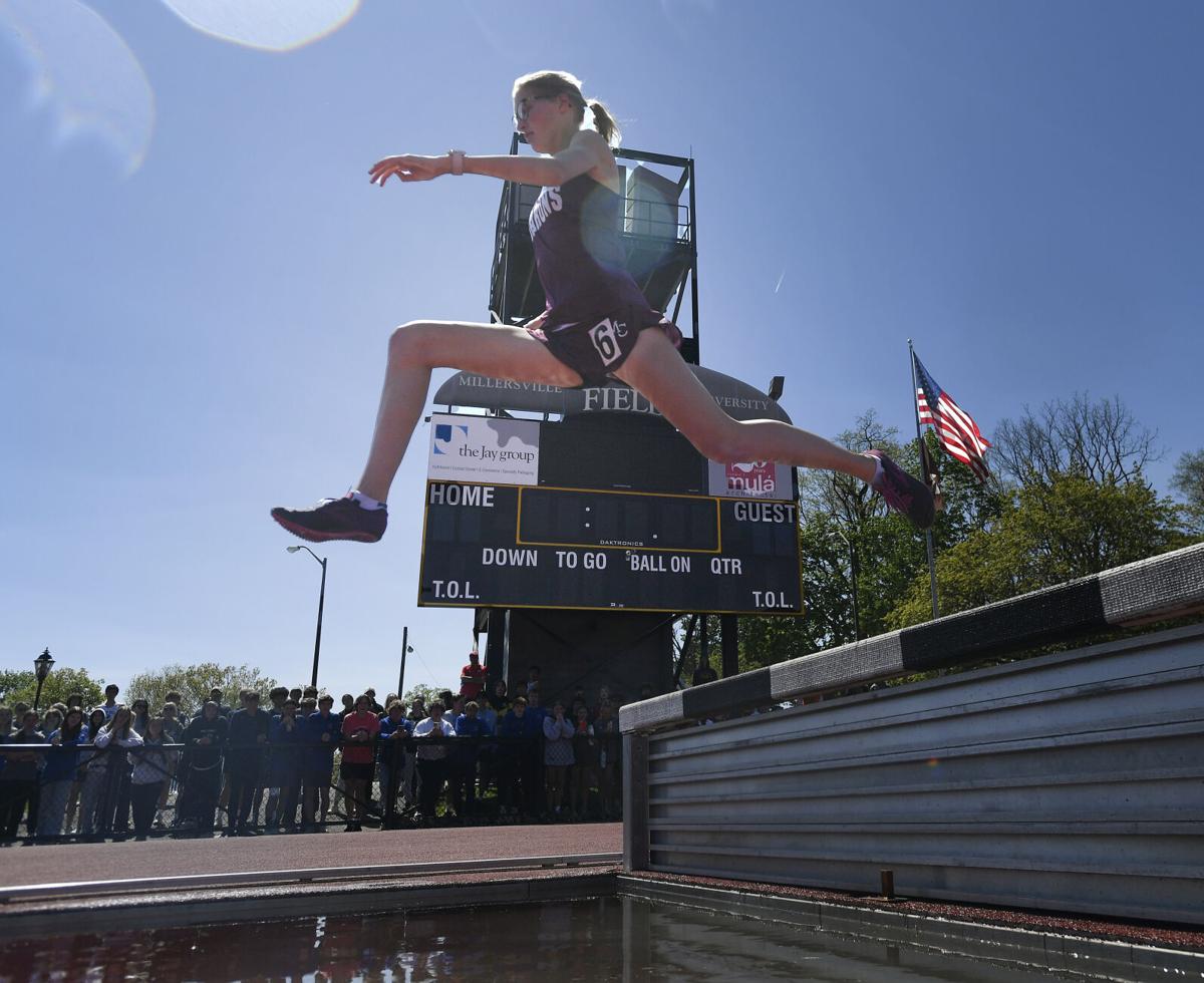 Manheim Central's Julie Lindberg conquers the steeplechase at the Cy ...