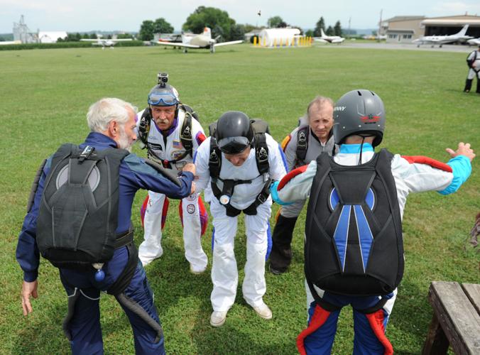 Group sets state skydiving record for Jumpers Over Seventy | Local News ...