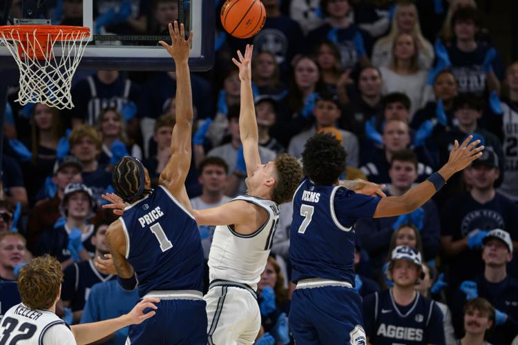 Mason Falslev scores 26 points to help No. 23 Utah State beat Nevada 71 ...