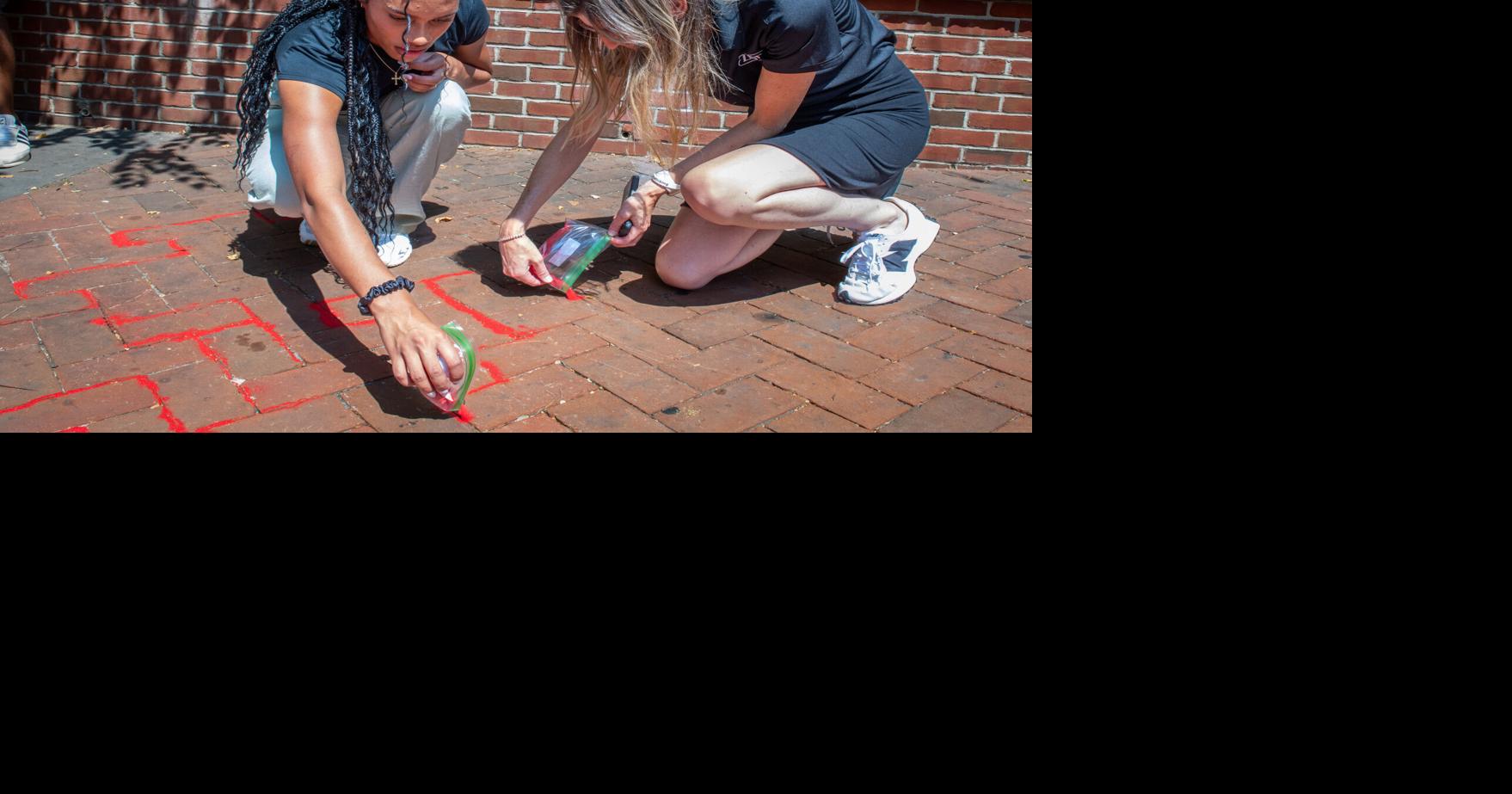 Red sand event in Penn Square raises awareness about human trafficking ...