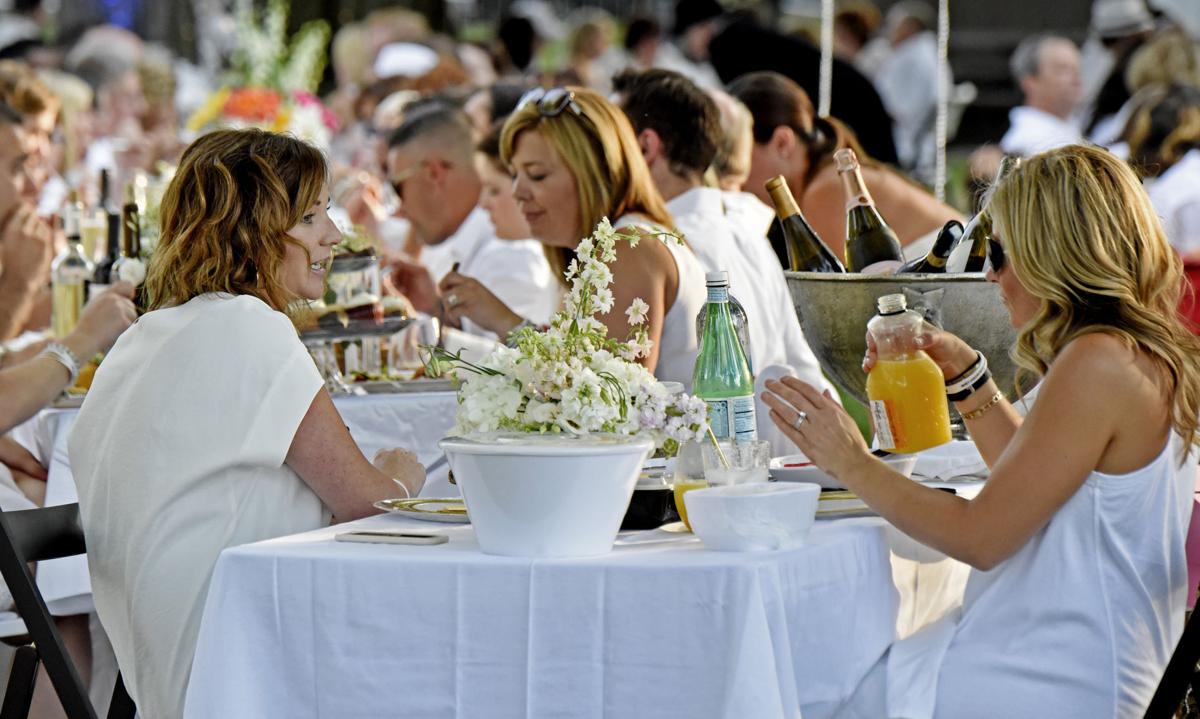 Summer night in white: Hundreds dine at Fete en Blanc in Lancaster's ...