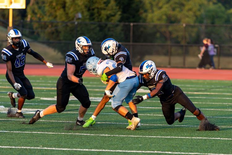 Mason Rotelli shows poise, capability in QB debut as Exeter blanks ...