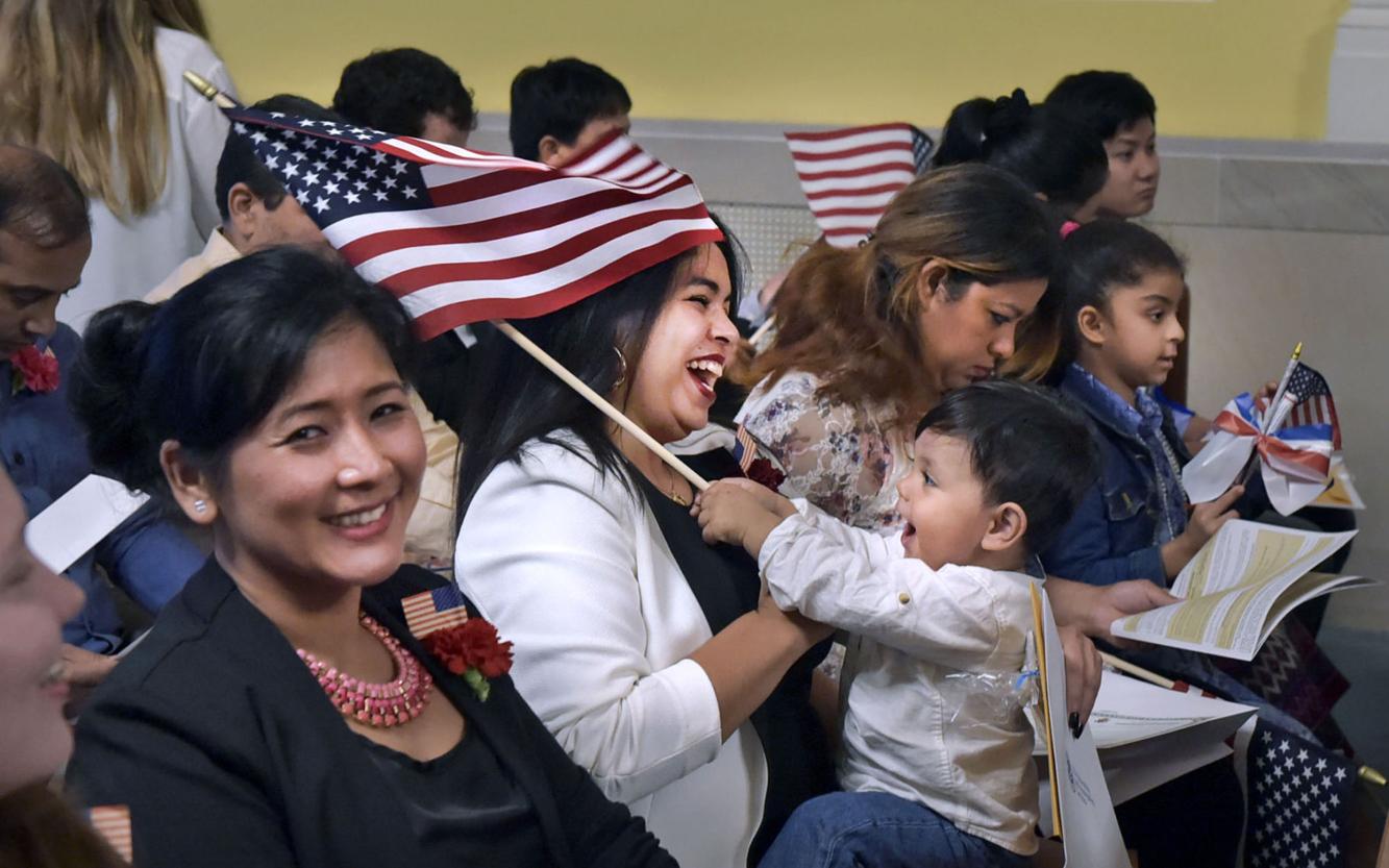 Drawn by the American dream, 66 immigrants become U.S. citizens in ...