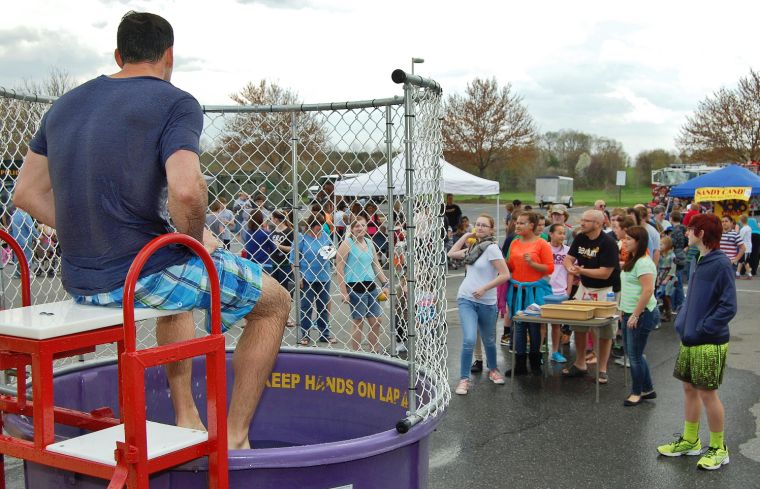 Family Fun Fest at Manor Middle School raises money with bouncing ...