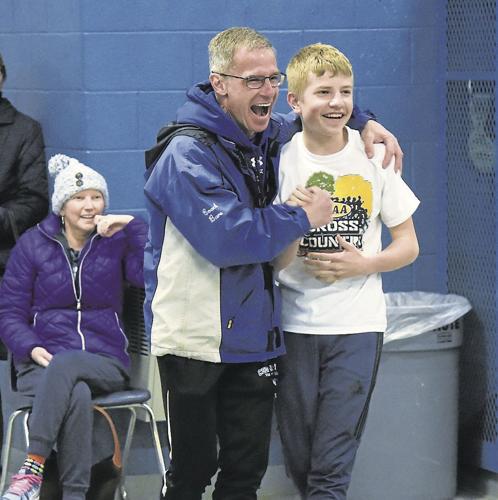 'Don't ever give up': Cedar Crest coach, son dedicate track and field ...