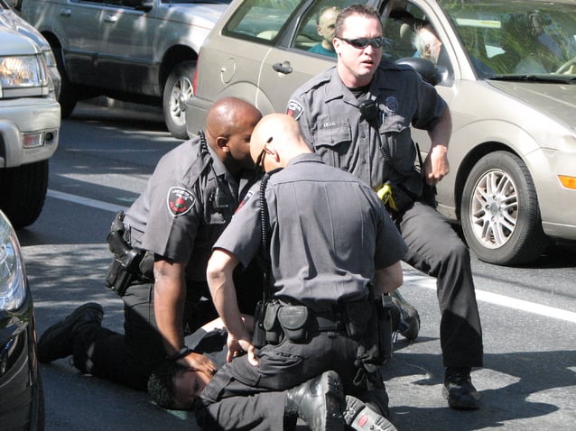 The story behind the photo: How a reporter captured police tackling a ...