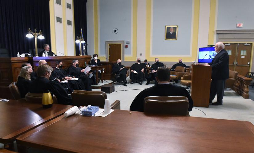 Panel of judges interview candidates for county commissioner [photos ...