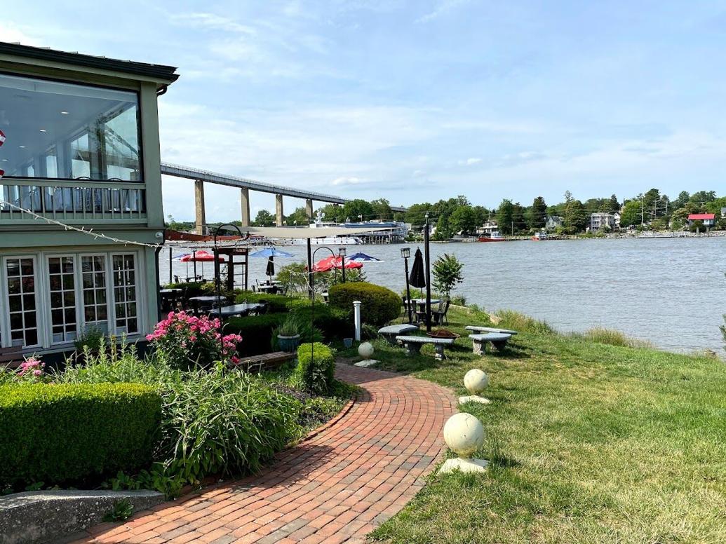Divided by canal, Chesapeake City, Maryland, a nice place to stroll, dine, bike, sit by the ...