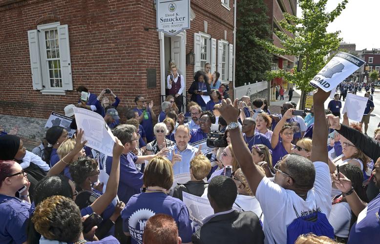 Hundreds rally in front of Smucker's office | Local News ...