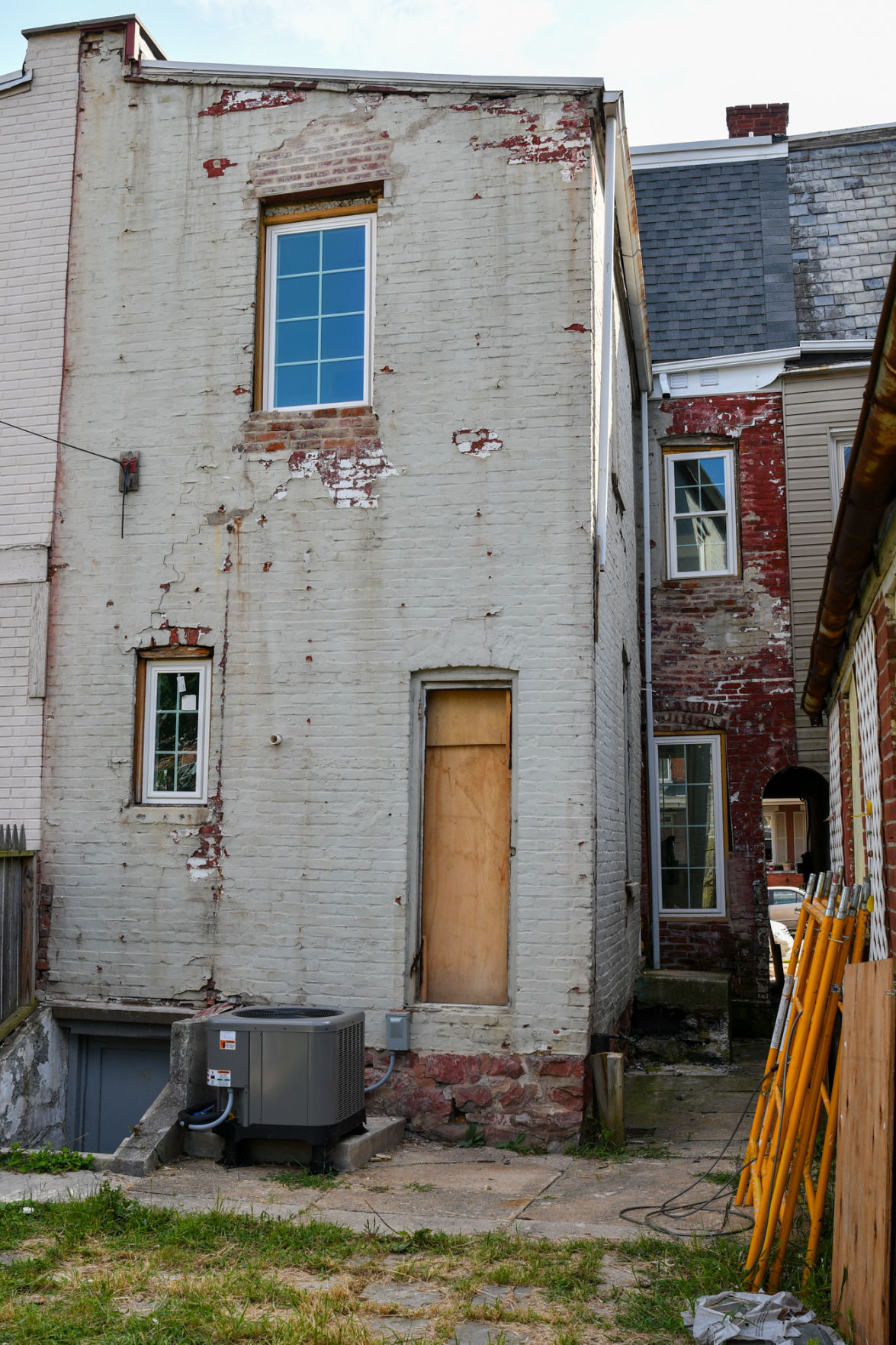 Residents still in limbo after condemnation of row houses; city ...