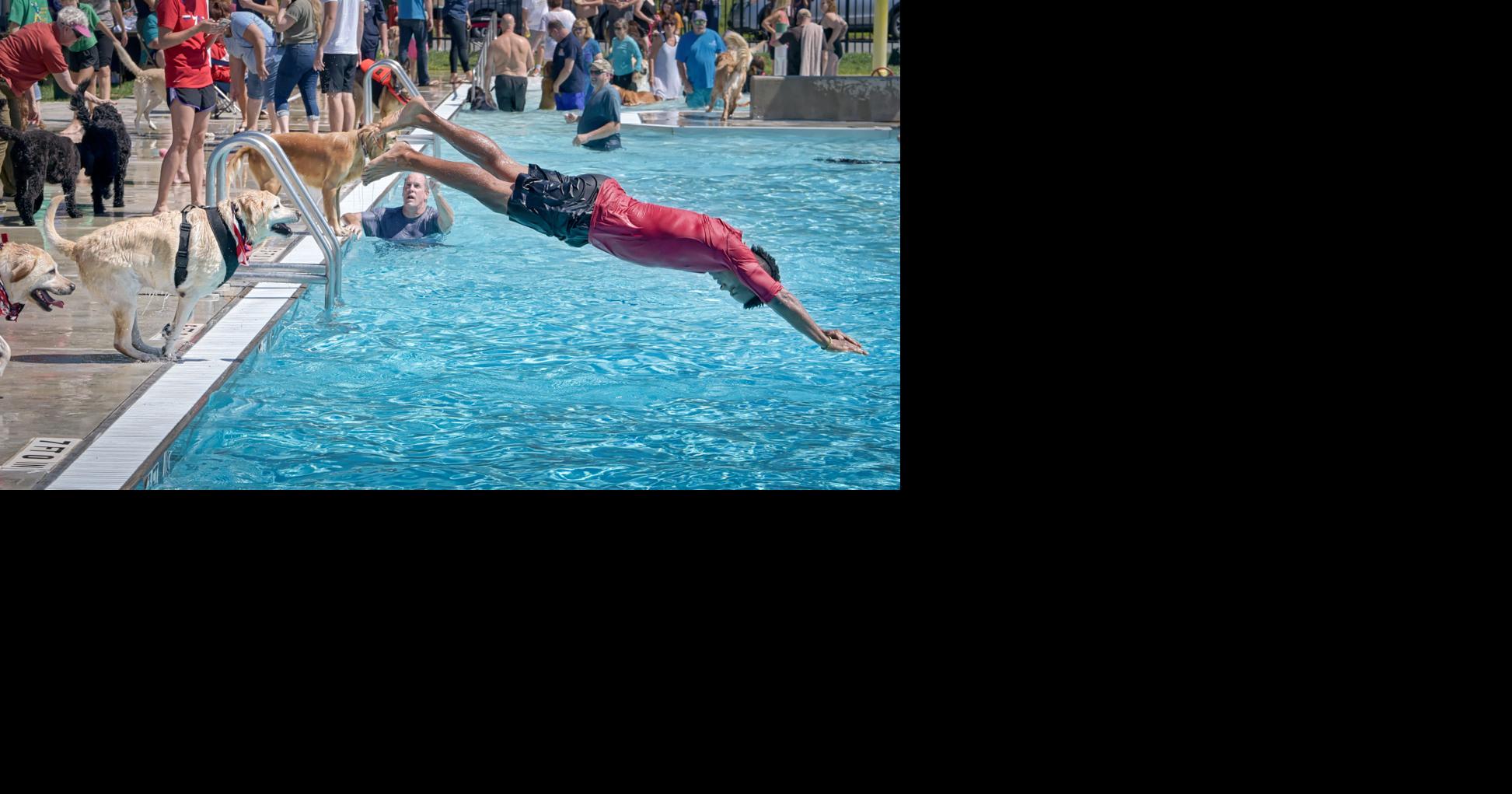 Ephrata residents take their dogs for a swim at the community pool ...