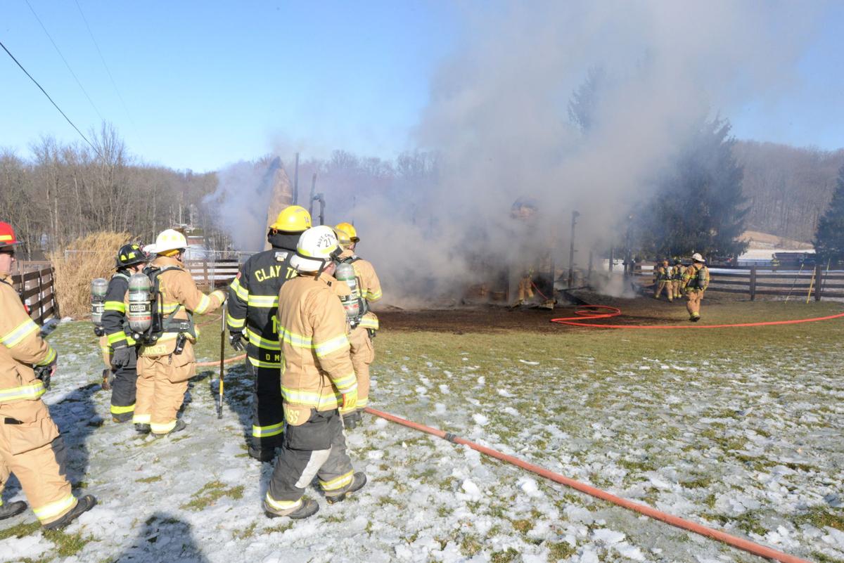 Smoke visible for miles from barn fire reported in Clay Township ...