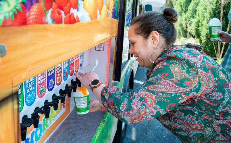 Kona Ice relieves tax day stress with shaved ice giveaway [photos ...