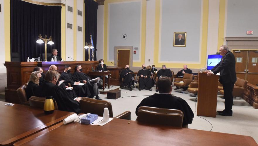 Panel of judges interview candidates for county commissioner [photos ...