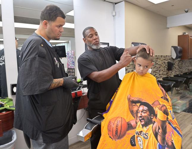 Champ's Barber Shop and School celebrates 20th anniversary with free ...