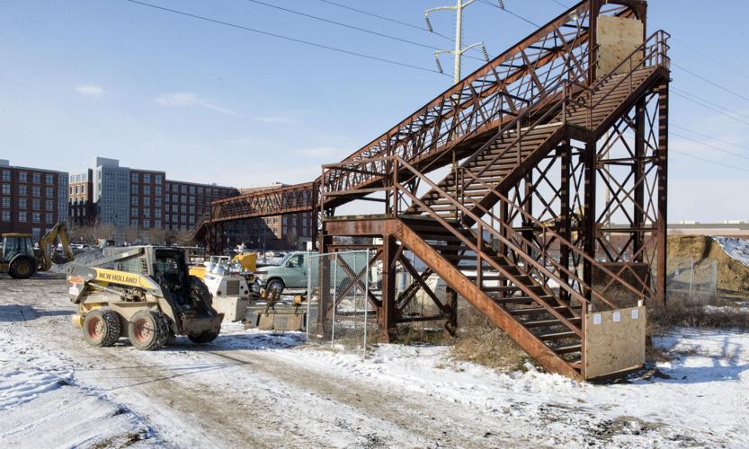 Signs urging Armstrong bridge be kept as-is popping up in city's ...