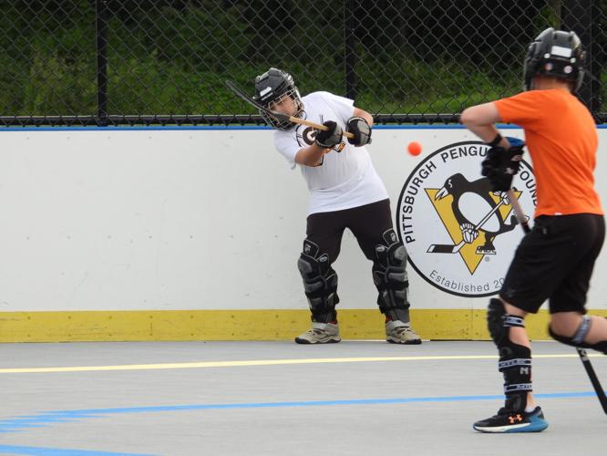 Parents defeat kids in season ending dek hockey exhibition game | Local ...