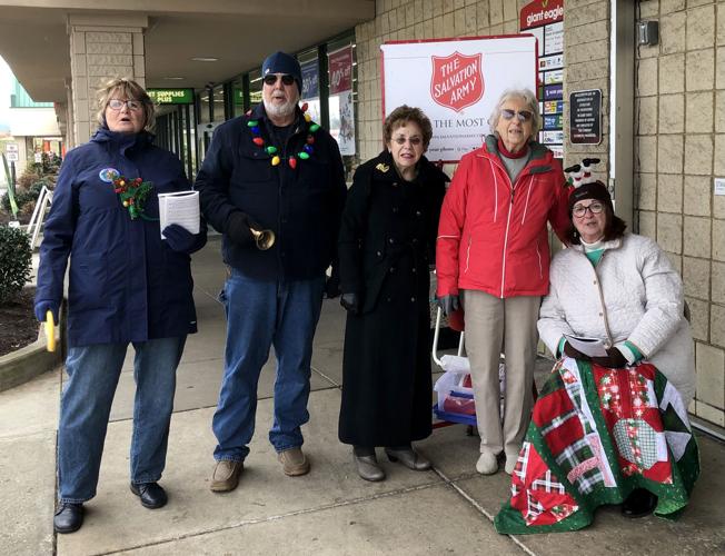 LUMC members carol, ring bell for Salvation Army | Local News ...