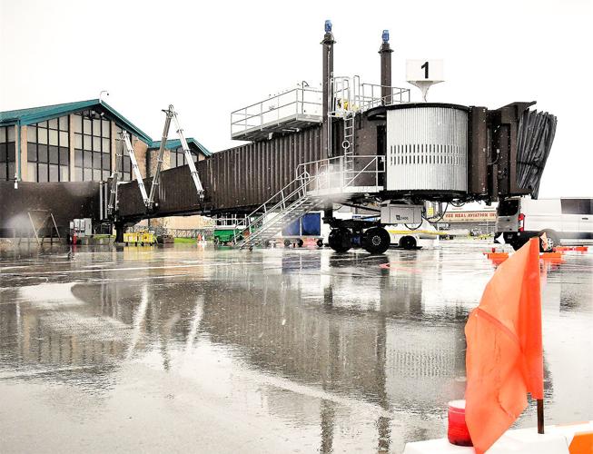 New passenger loading bridge at airport to be ready for use next month ...