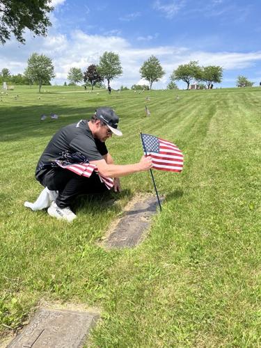 Live! Casino Pittsburgh volunteers honor veterans by placing flags ...