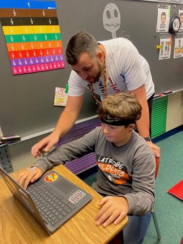 Fourth-graders learn spooky coding with ‘Robot Haunted House ...