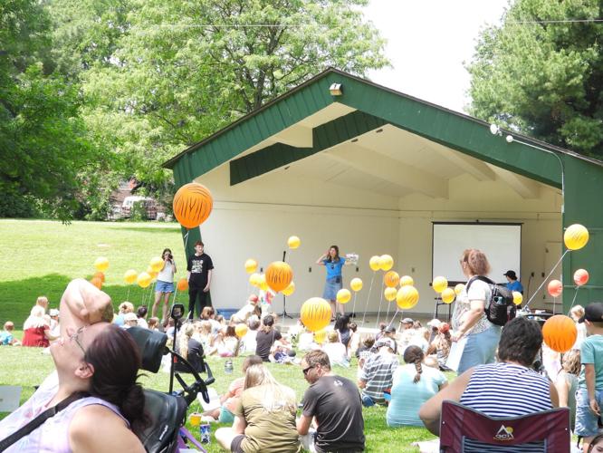Families gather for story time with Karen Herc during Mister Rogers ...