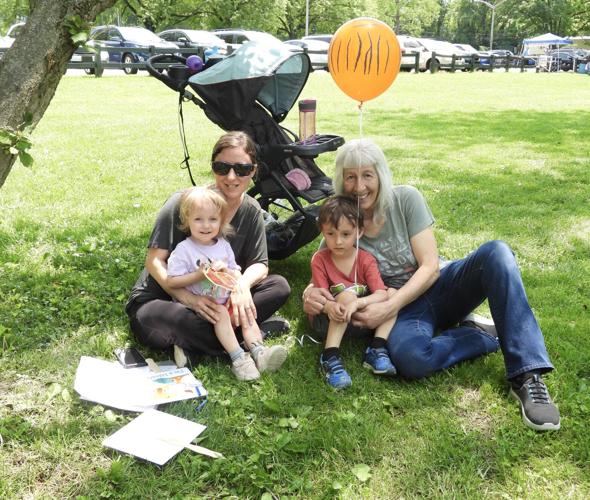 Families gather for story time with Karen Herc during Mister Rogers ...