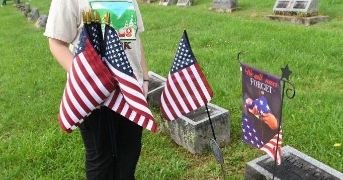 Ligonier Valley students set flags at gravesites | Local News ...