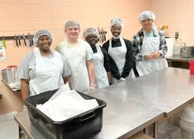 Culinary Arts students help feed youngsters for Thanksgiving ...